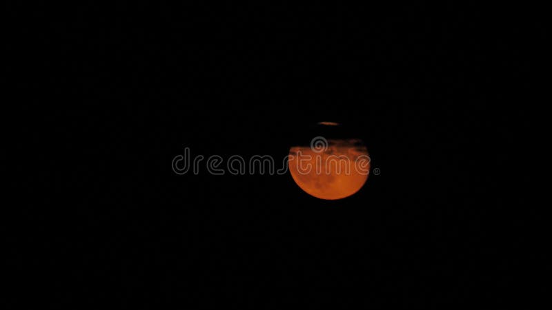 Beautiful Red Moon Moves Quickly Behind the Black Clouds Stock Footage ...