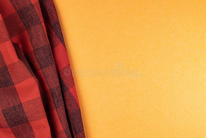 Beautiful Red Plaid Fabric on a Yellow Abstract Background, Space for ...