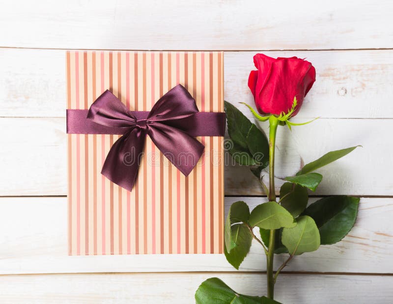 Beautiful Red Rose and Gift Stock Photo - Image of purple, rose: 65656486