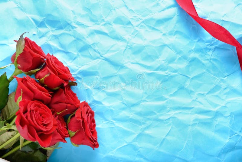 Beautiful Red Roses on Crumpled Packing Paper Stock Image - Image of ...