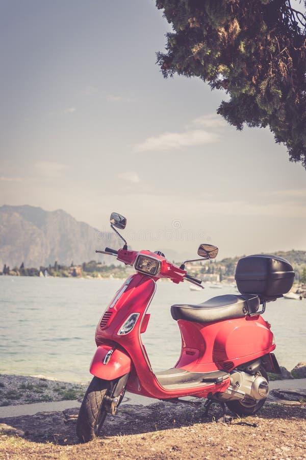 Beautiful Red Scooter on the Beach, Landscape and Blue Sky Stock Image ...