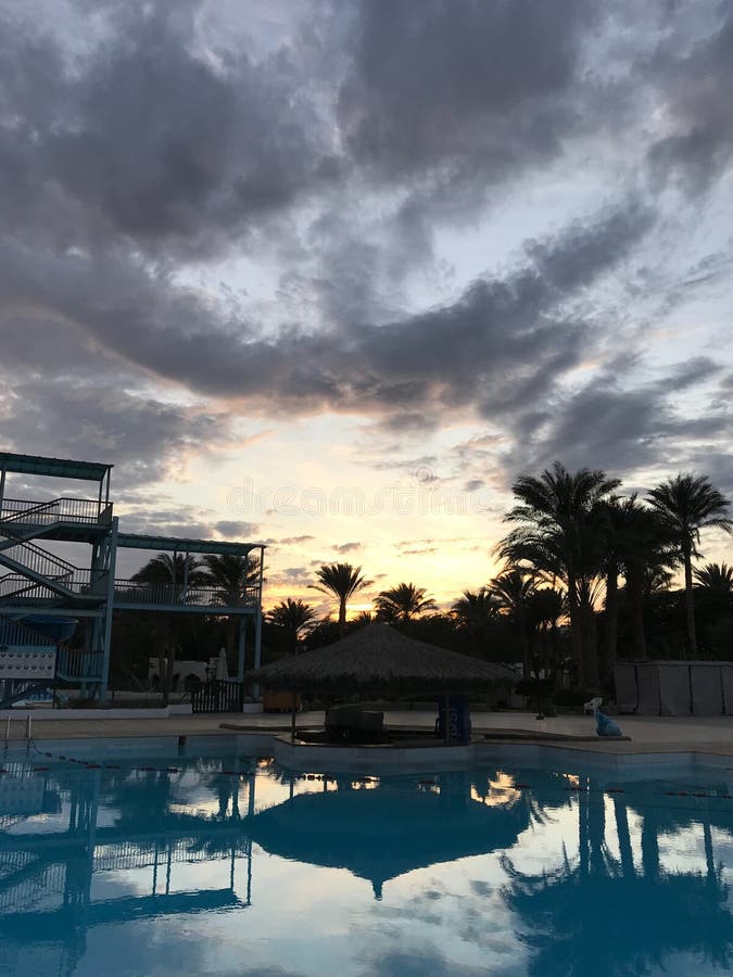 Sunset near the pool stock photo. Image of view, travel - 171819840