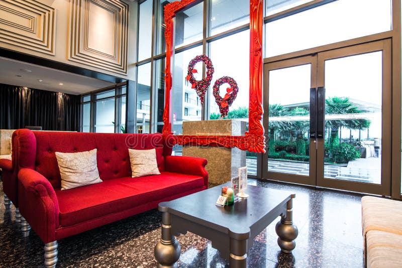Beautiful Red Sofa and Vintage Table at Reception Stock Image - Image ...