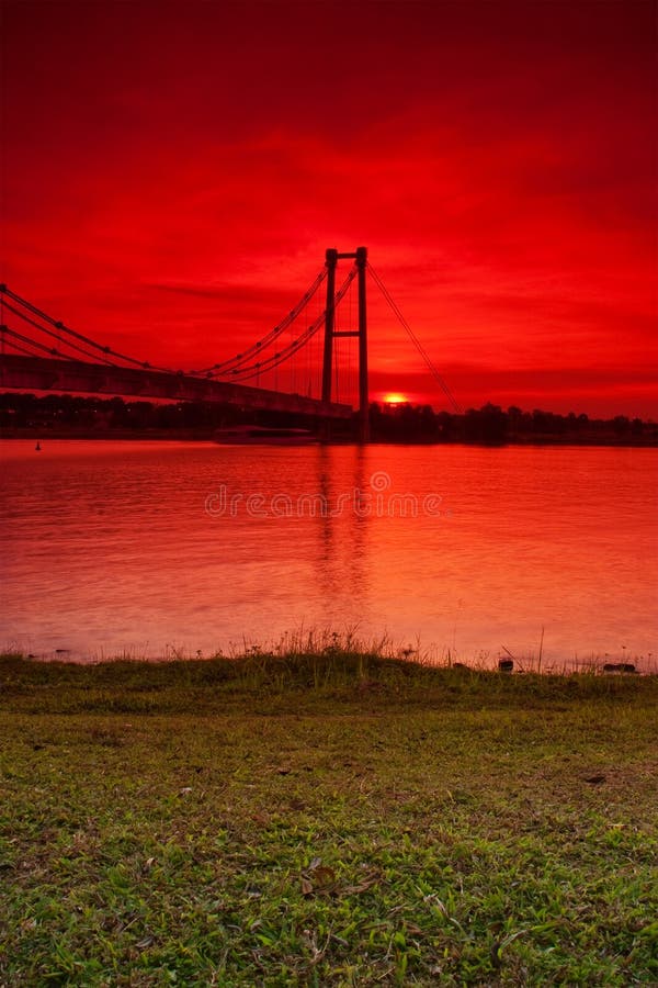 Beautiful Red Sunset Near a Bridge Stock Photo - Image of beach, bright ...