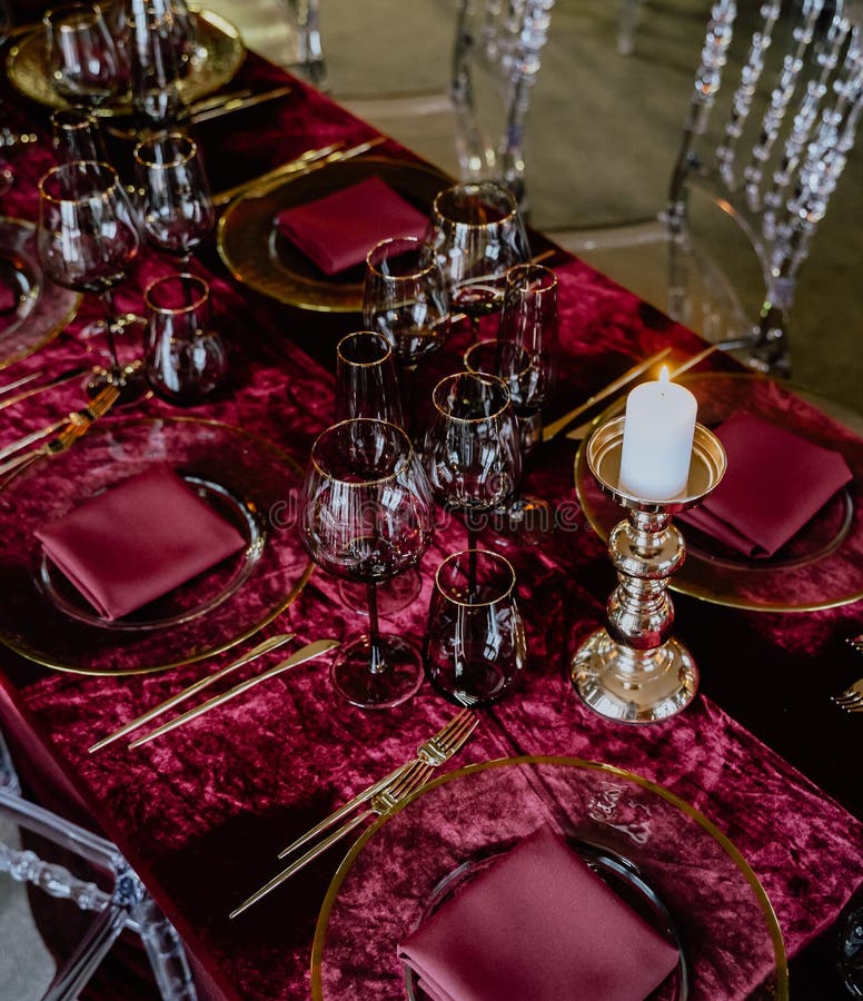 Beautiful Red Table Setting with Luxurious Tableware and a Candle in ...