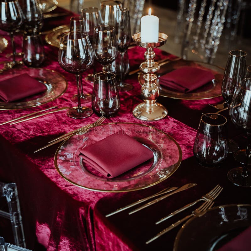 Beautiful Red Table Setting with Luxurious Tableware and Candles in a ...