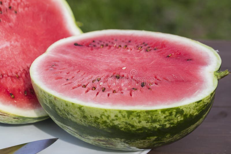 A Beautiful Red Watermelon Was Cut into Two Parts Stock Photo - Image ...