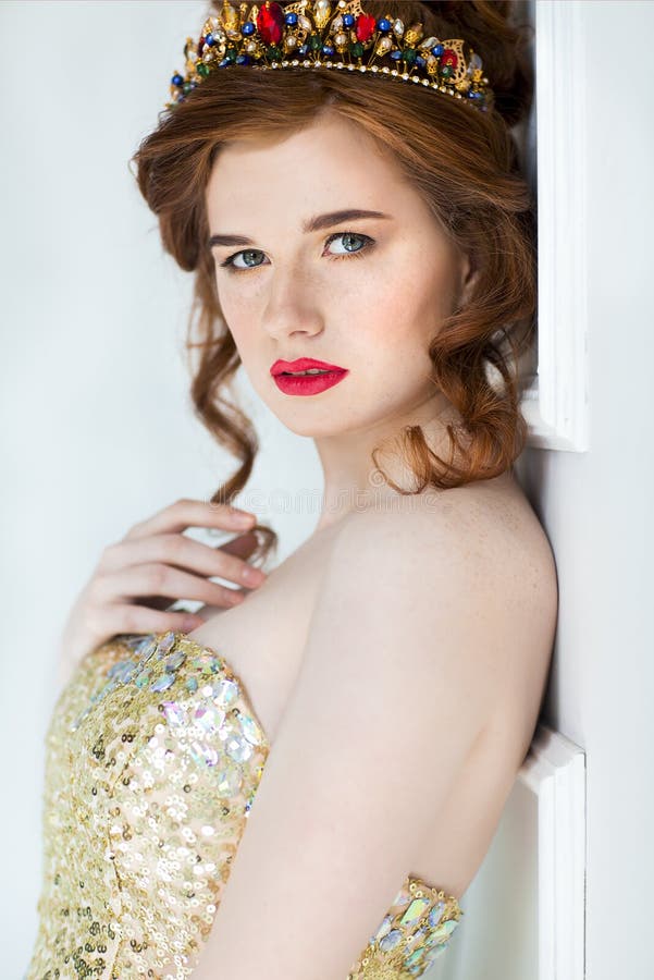 Beautiful Redhaired Fashion Model Posing In Evening Dress And In Stock