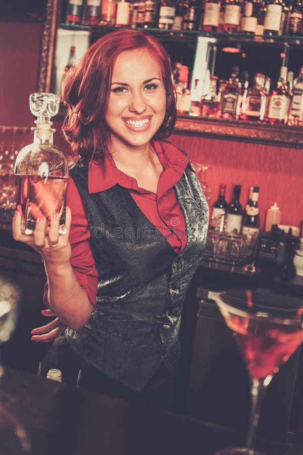 Beautiful redhead barmaid stock image. Image of cocktail - 49409865