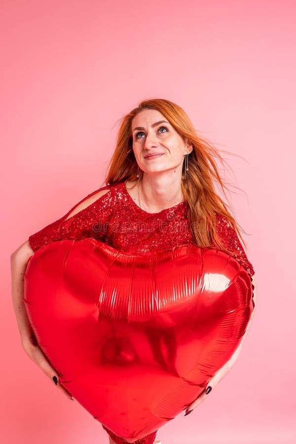 Beautiful Redhead Girl With Red Heart Baloon Posing Happy Valentine`s