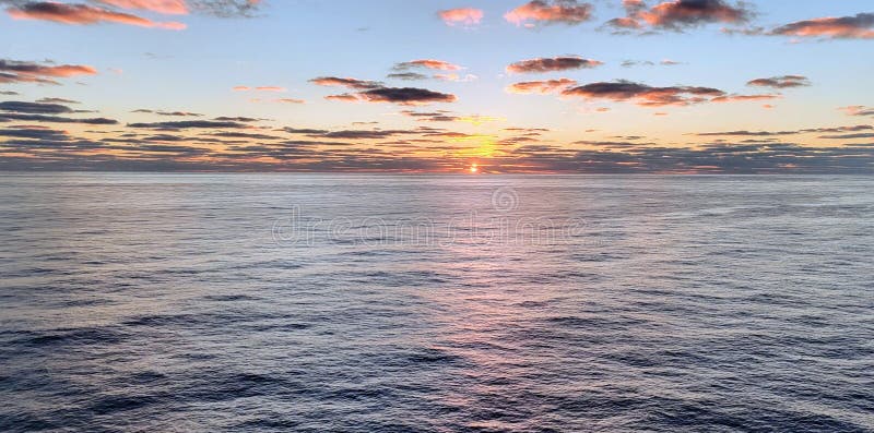 Beautiful Reflections: Over the Ocean at Sunset Stock Photo - Image of ...