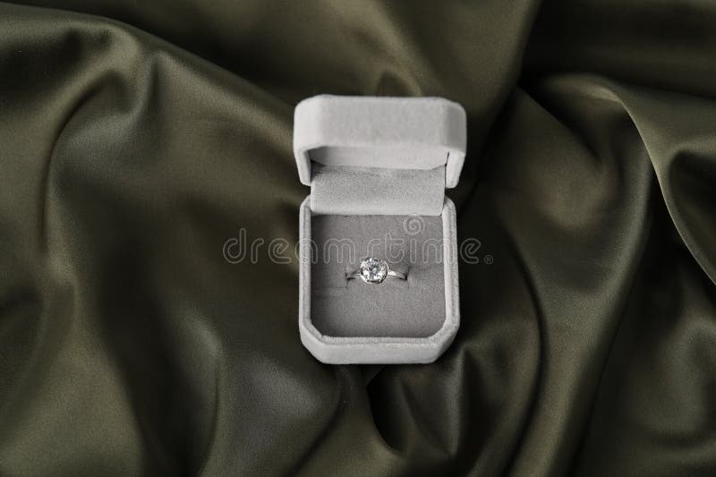 Beautiful Ring with Gemstone in Box on Dark Fabric, Top View Stock ...