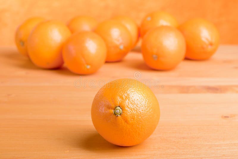 Beautiful Ripe Oranges on the Table and a Yellow Orange Background ...