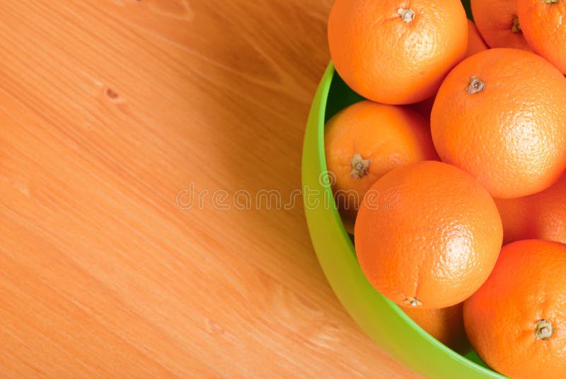 Beautiful Ripe Oranges on the Table and a Yellow Orange Background ...