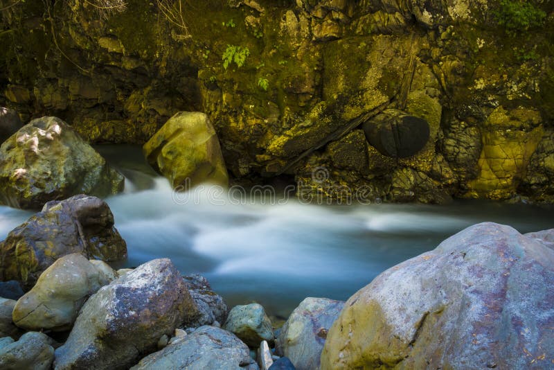 Beautiful River Flowing among Rocks Stock Image - Image of flowing ...