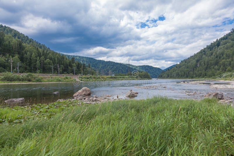 A Beautiful River with a Railway Running Along it Stock Photo - Image ...