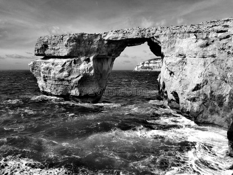 Beautiful Rock Azure Window Along the Coast of Malta in Grayscale Stock ...