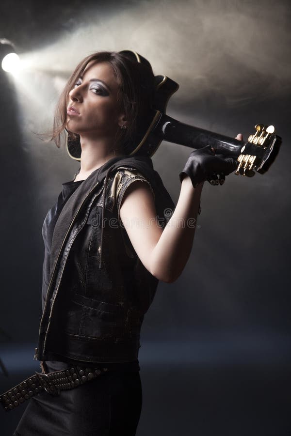 Beautiful Rock Girl Posing with Her Guitar Stock Photo - Image of ...