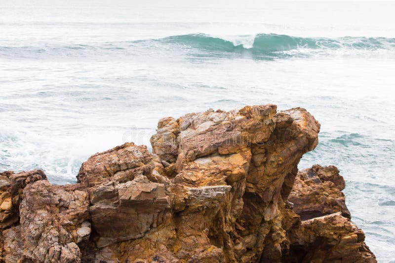 Beautiful Rock Standing on the Beach. Sunset Stock Photo - Image of ...