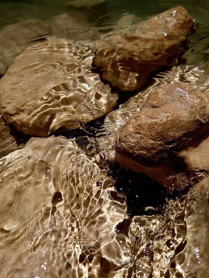 Beautiful Rocks with Reflections of Light from Clear Flowing Water ...