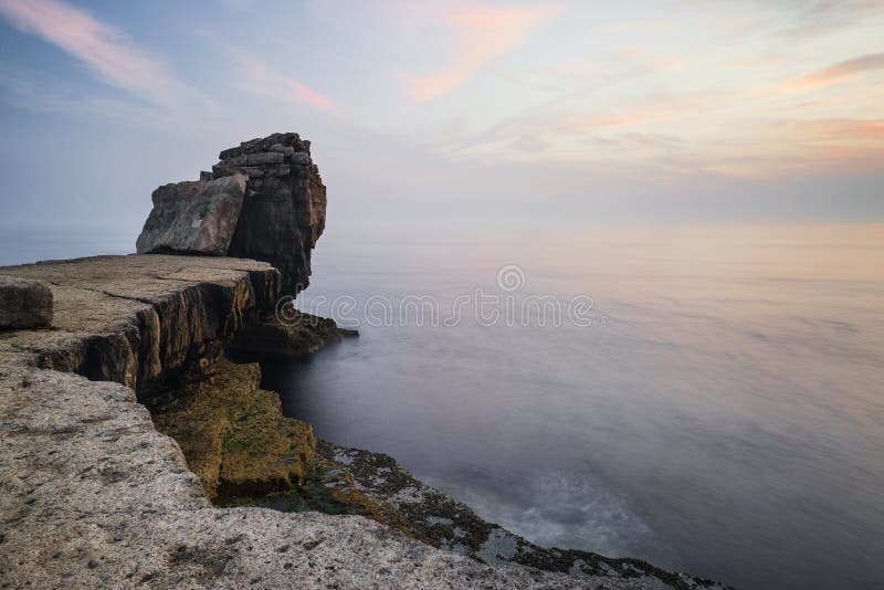 Beautiful Rocky Cliff Landscape with Sunset Over Ocean Stock Image ...