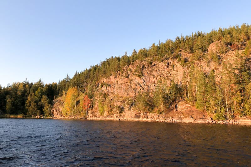 Rocky Lake Shore During Sunset Picture. Image: 83064884