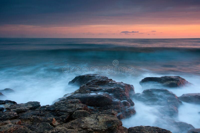 Beautiful rocky sea beach stock photo. Image of paradise - 23982288
