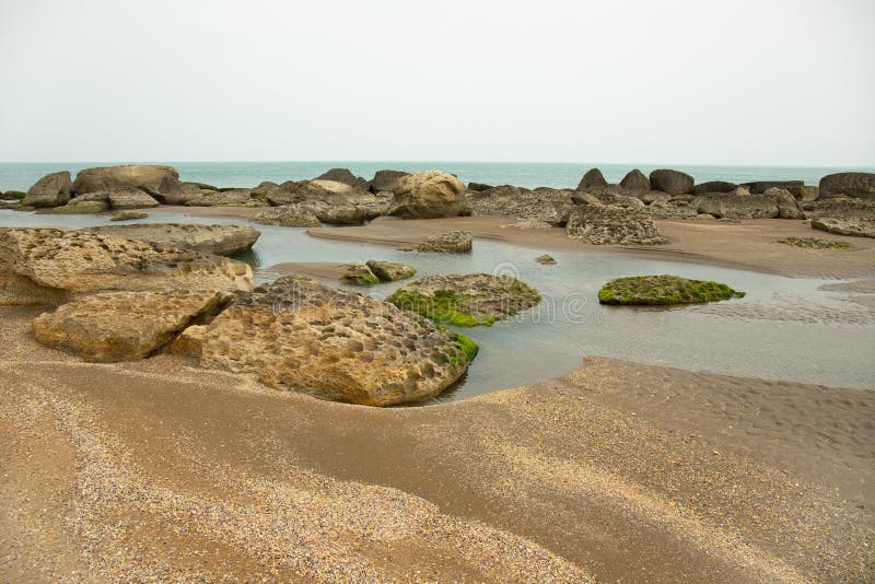 Beautiful rocky seashore stock photo. Image of scenic - 248848460