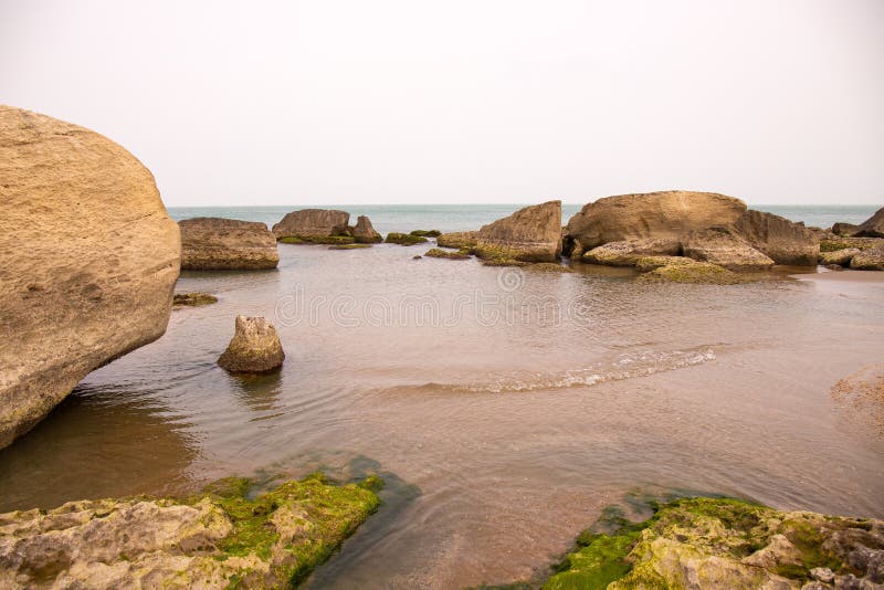 Beautiful rocky seashore stock image. Image of view - 259706559