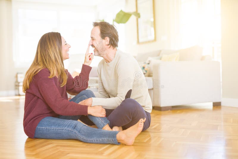 Beautiful Romantic Couple Sitting Together on the Floor at Home Stock ...