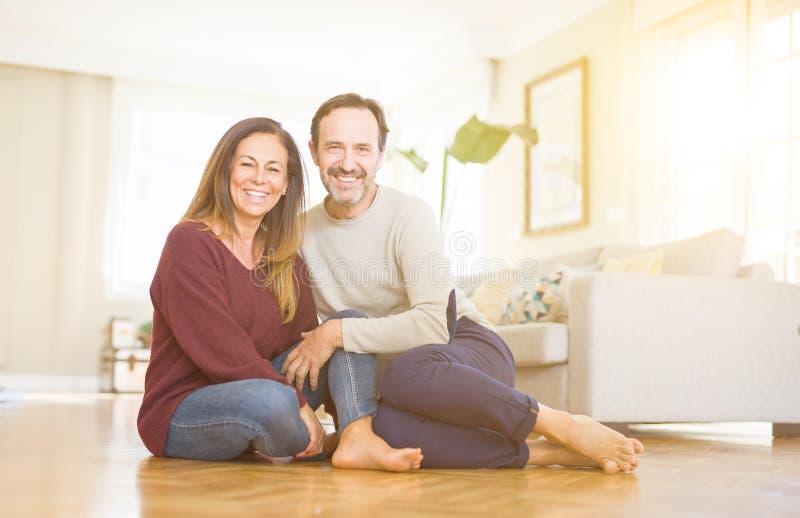 Beautiful Romantic Couple Sitting Together on the Floor at Home Stock ...