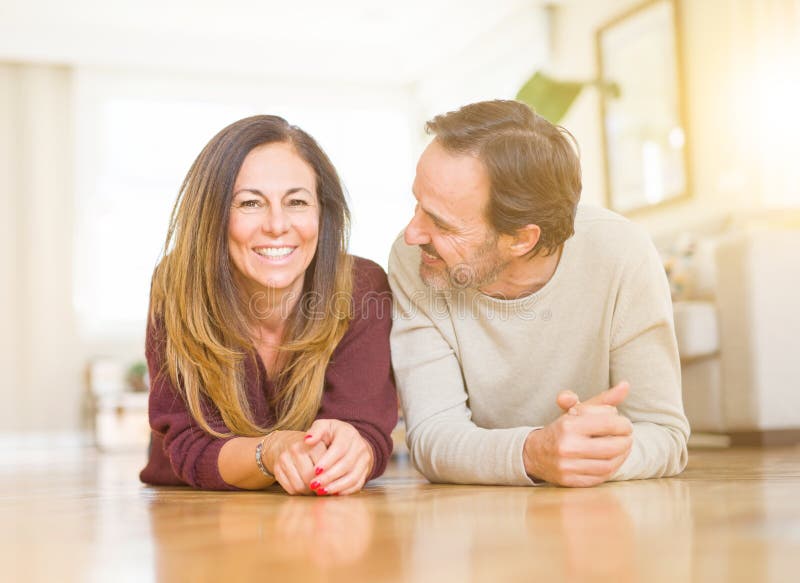 Beautiful Romantic Couple Sitting Together on the Floor at Home Stock ...