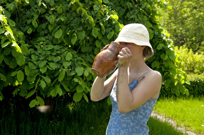Beautiful Romantic Young Woman Drinking in the Spr Stock Photo - Image ...
