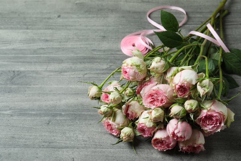 Beautiful Rose Flowers on Gray Textured Background Stock Image - Image ...