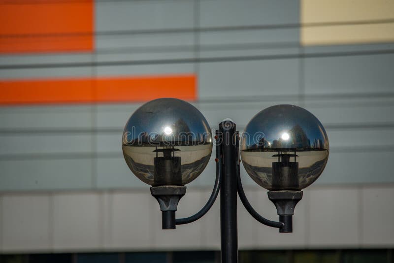 Beautiful, Round Street Lights with the Reflection of a Building in ...