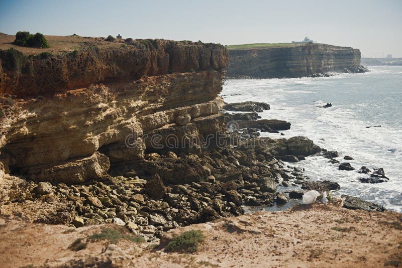 Beautiful Rugged Coastline with Waves Crashing Against the Cliffs Stock ...