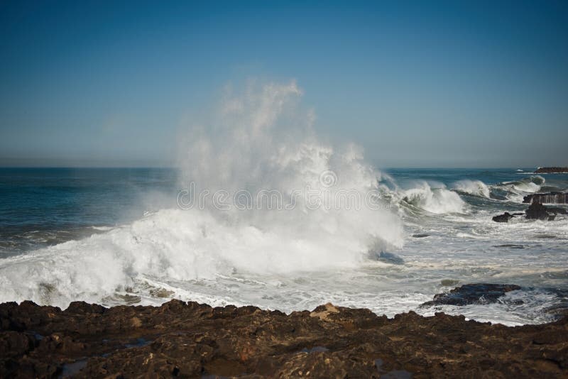 Beautiful Rugged Coastline with Waves Crashing Against the Cliffs Stock ...