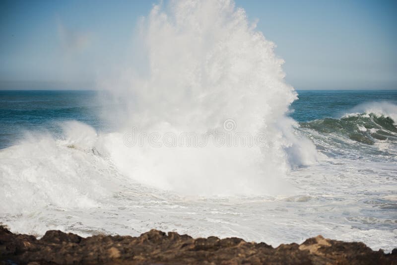 Beautiful Rugged Coastline with Waves Crashing Against the Cliffs Stock ...