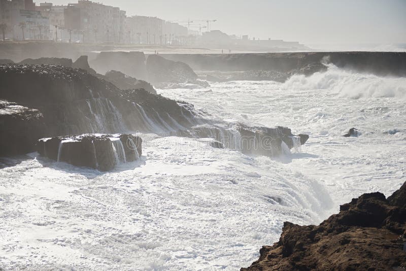 Beautiful Rugged Coastline with Waves Crashing Against the Cliffs Stock ...