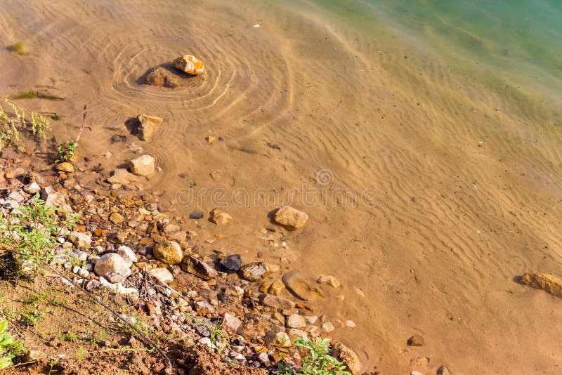 Beautiful Sandy Beach with Rocks and Clear Water Stock Image - Image of ...