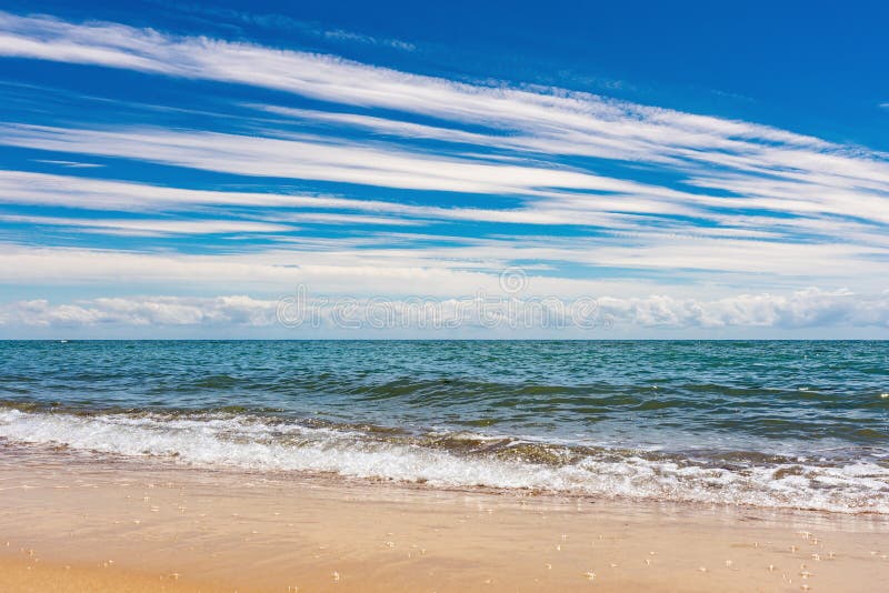 Beautiful Sandy Seashore with Blue Sky and Clouds Stock Image - Image ...