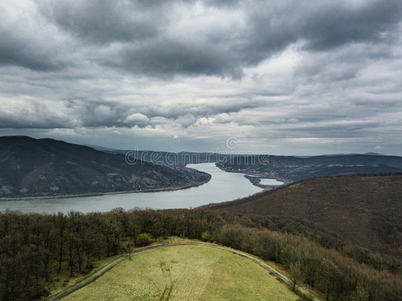 Beautiful Scene of a River between Hills and Forest Under the Cloudy ...