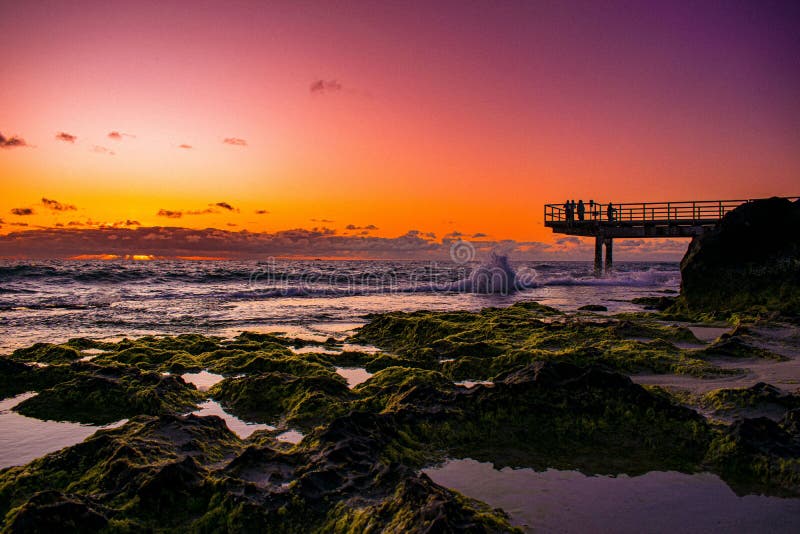 Beautiful Scene of the Sunset at North Beach Jetty Covered with ...