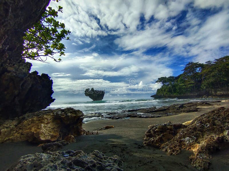 Beautiful Scenery on the Beach with a Unique Small Island Stock Photo ...