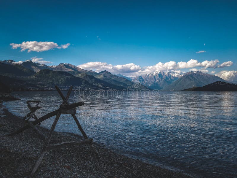 Beautiful Scenery of a Calm Lake Surrounded by Hills Under the Cloudy ...