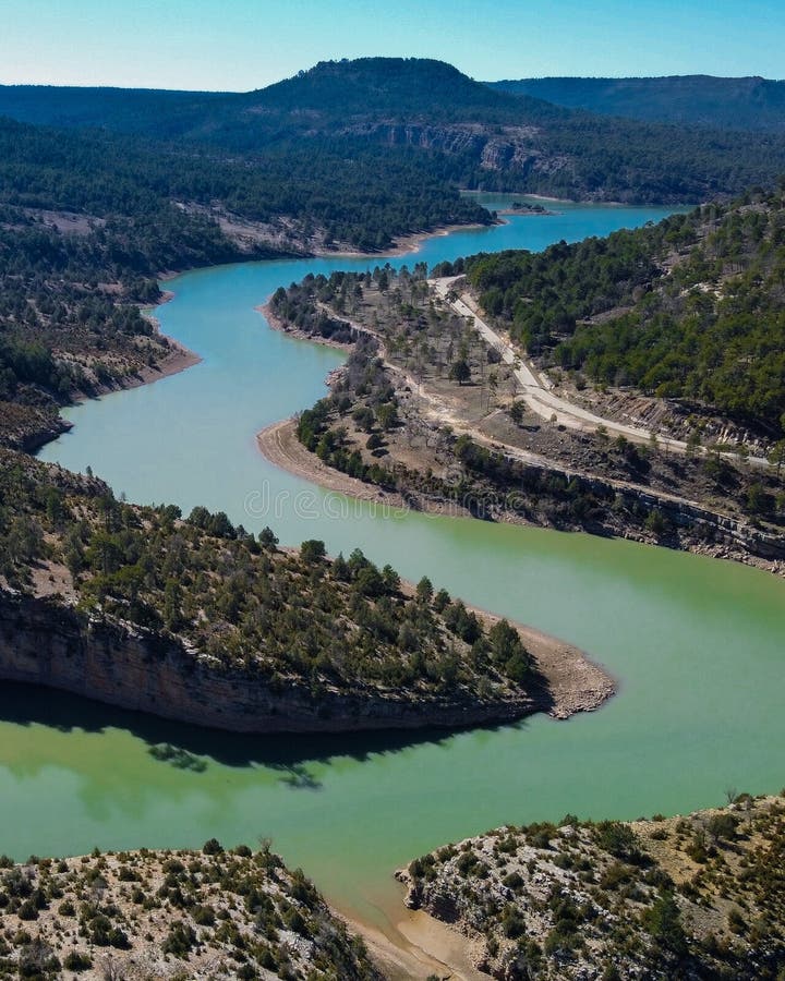 Beautiful Scenery of a River Flowing between High Rocky Mountains Stock ...