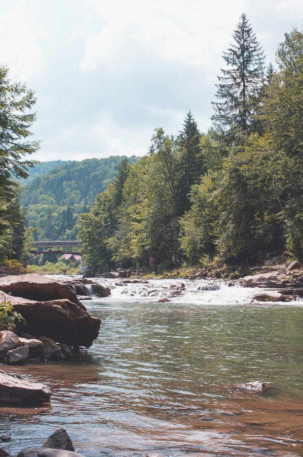 Beautiful Scenery with River and Riverside with Stones at Mountains ...