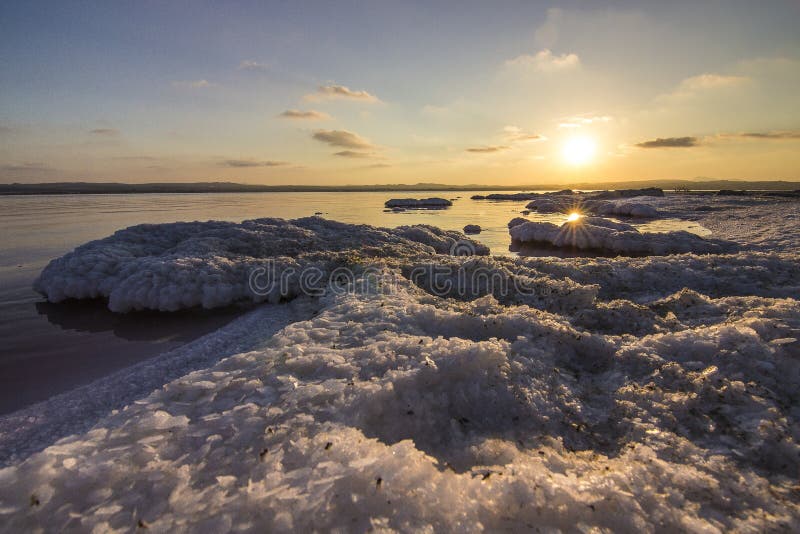 Beautiful Scenery of a Salty Beach during a Sunrise Stock Photo - Image ...
