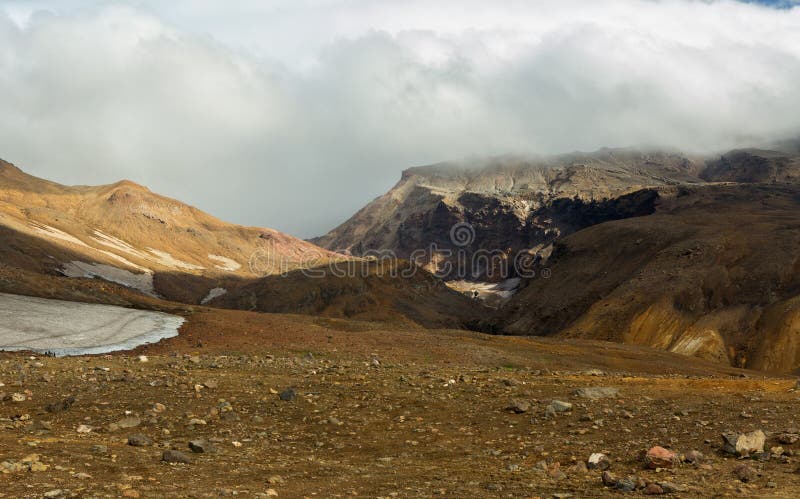 Beautiful Scenery Slopes of Volcano Mutnovsky with Clouds. Stock Photo ...