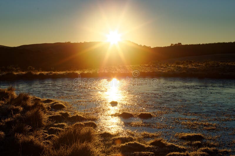 Sun shining over river stock image. Image of forested - 20860703